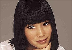 Danielle Suzuki volta de férias com gravação na mala - OFuxico