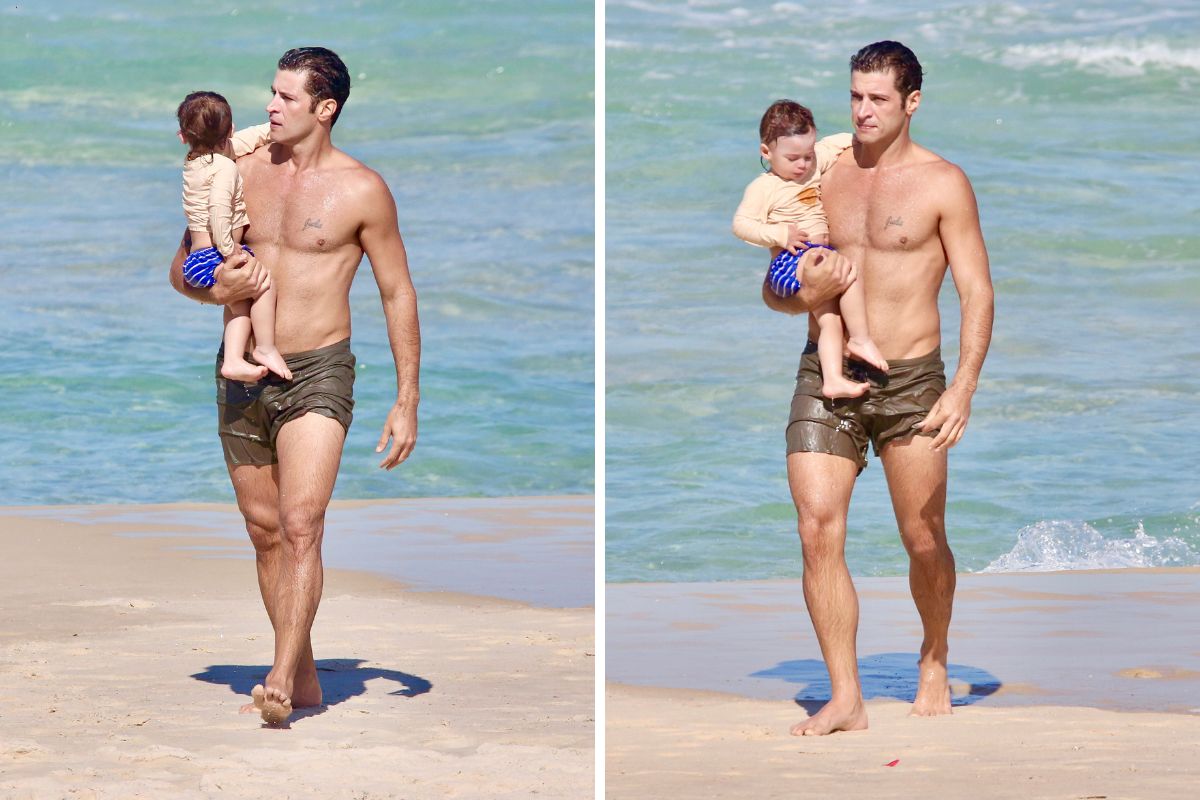 Leandro Lima mostra os músculos em dia na praia